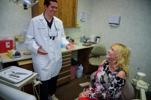 Dr. Knott with female patient in office